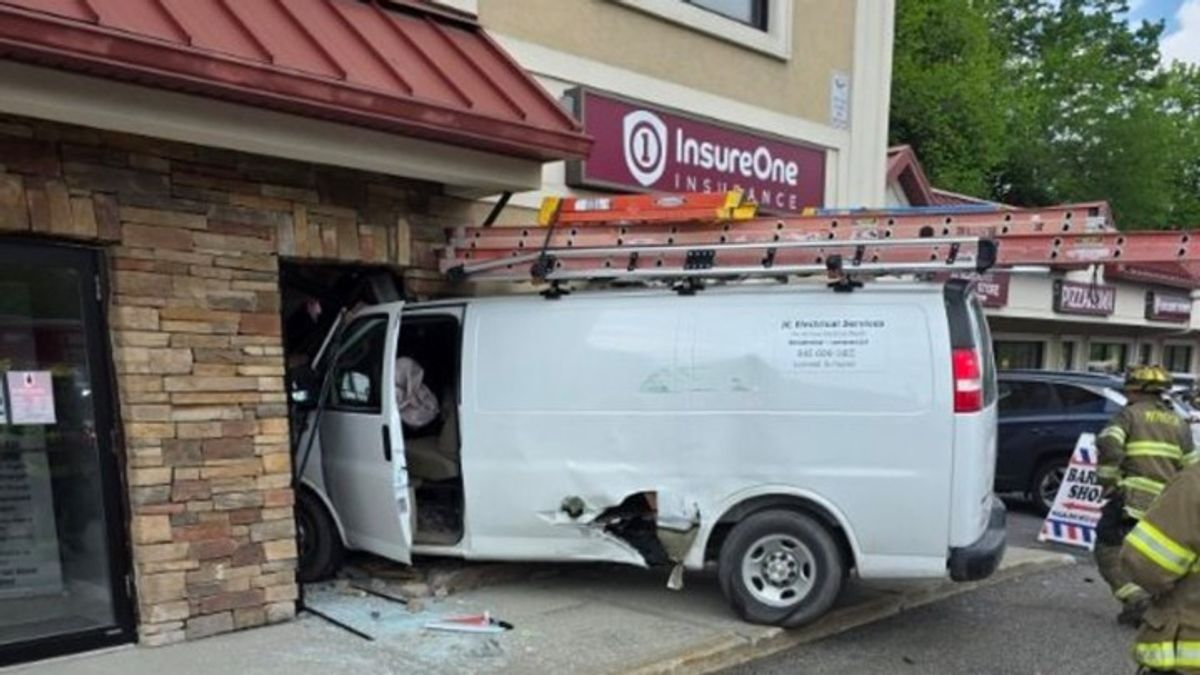 Surveillance video shows van crash into Monroe insurance office ...