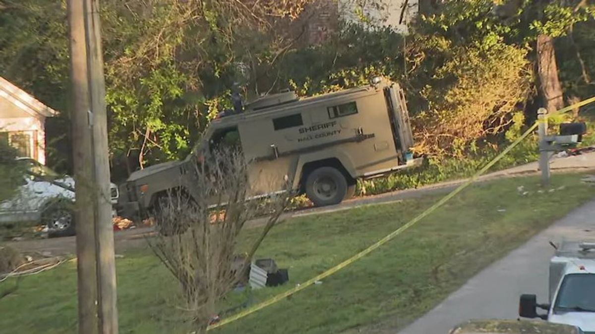 Bullet fired at officer stopped by radio mic on chest, suspect dead in ...