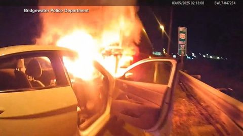 Police officer rescues driver from burning car | Haystack News