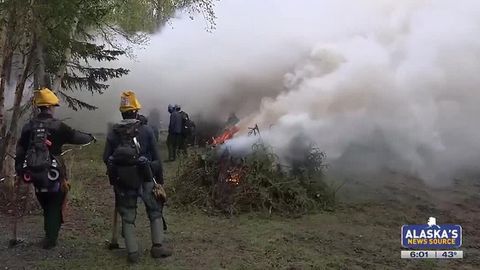Smoke on the Anchorage Hillside is part of a controlled burn to reduce ...