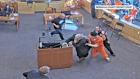 Murder suspect attacked by victim's family in wild courtroom brawl ...